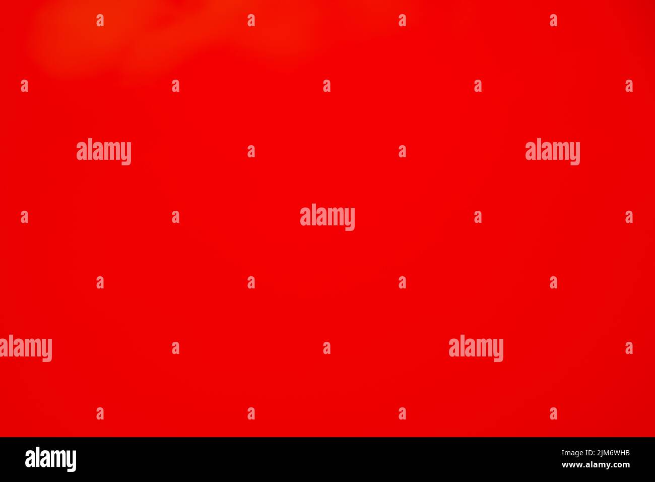 A bright red background for wallpapers Stock Photo - Alamy