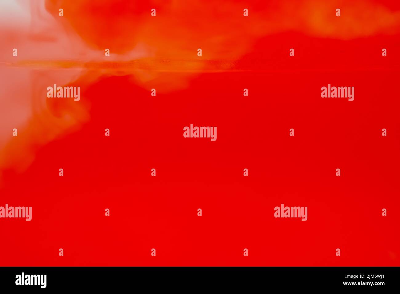 A solid bright red background for wallpapers Stock Photo - Alamy
