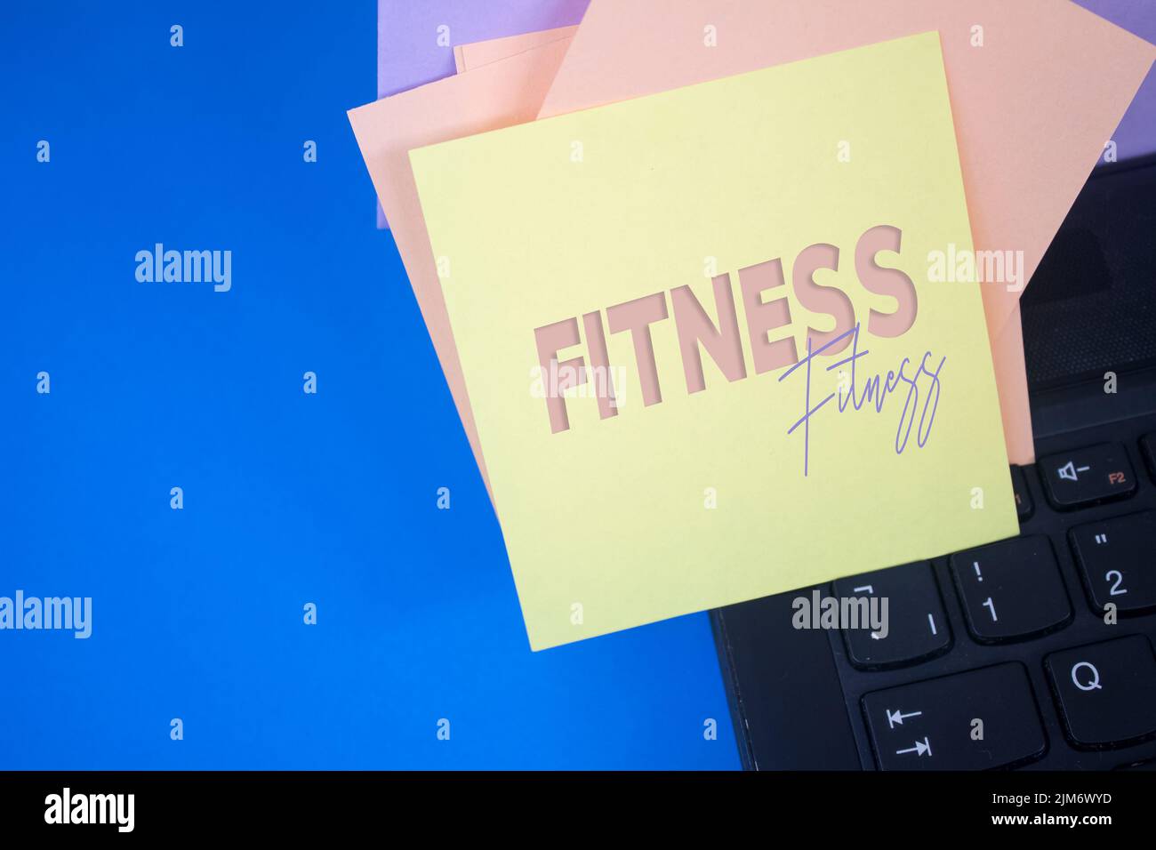 Fitness. Text on adhesive note paper. Event, celebration reminder ...
