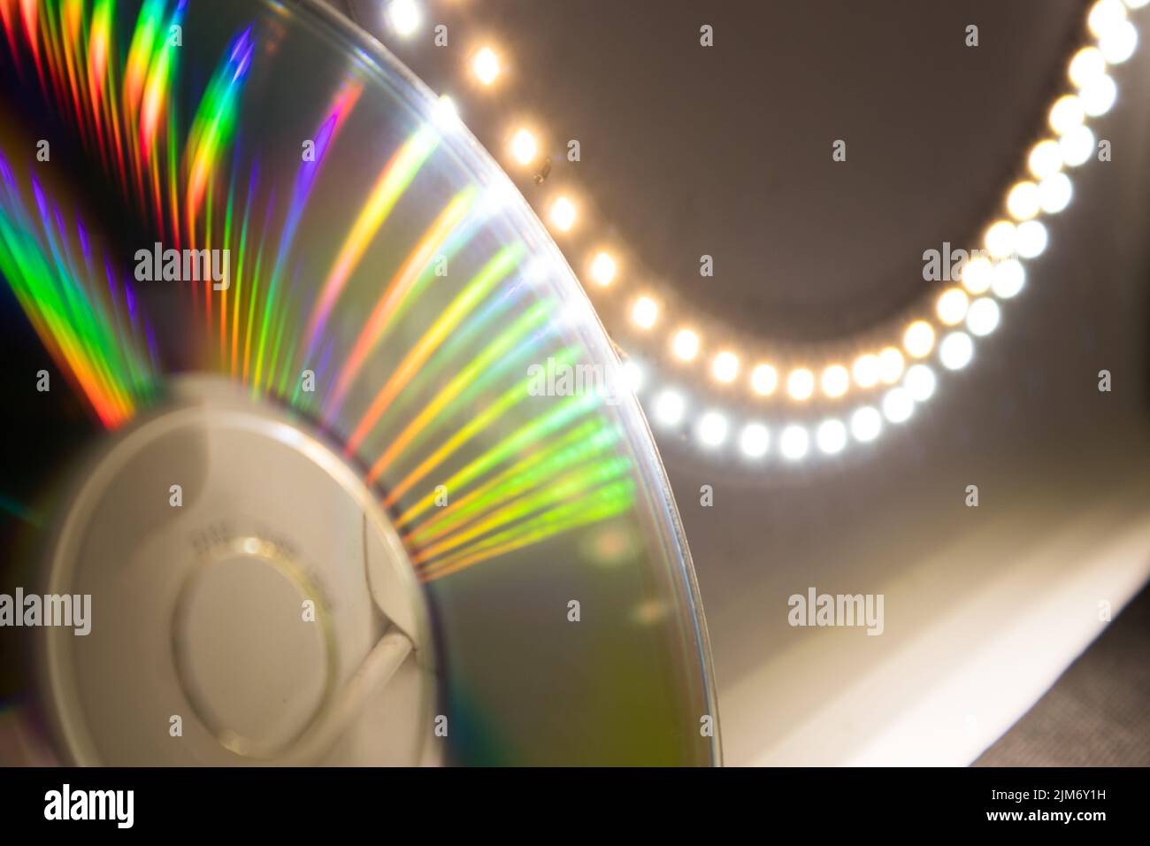 Reflection of light in a Compact Disk(CD) or Digital versatile disk(DVD ...