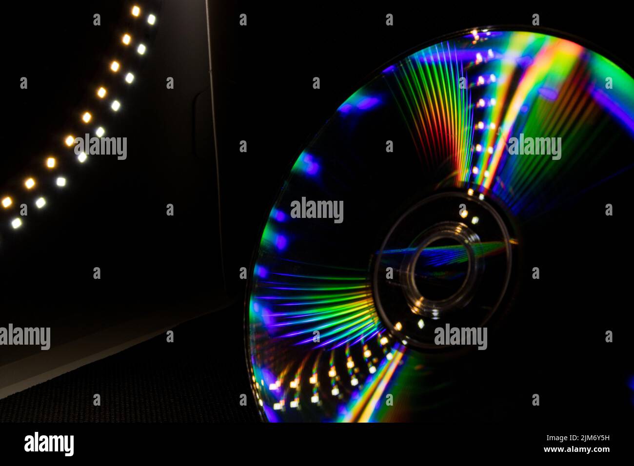 Reflection of light in a Compact Disk(CD) or Digital versatile disk(DVD ...