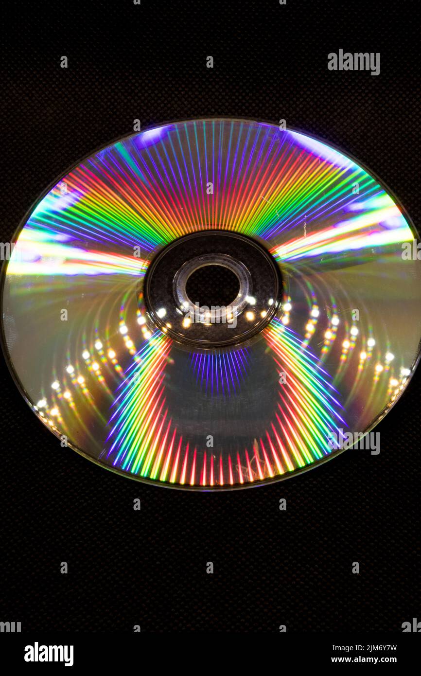 Reflection of light in a Compact Disk(CD) or Digital versatile disk(DVD ...