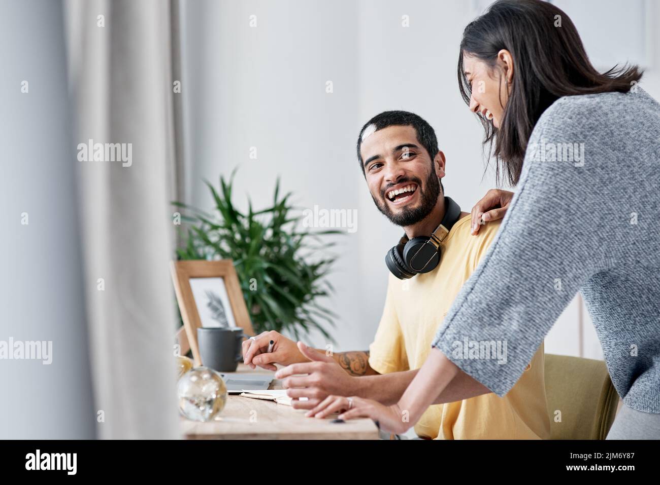 Home life, say hello to work life. a happy young couple working from ...