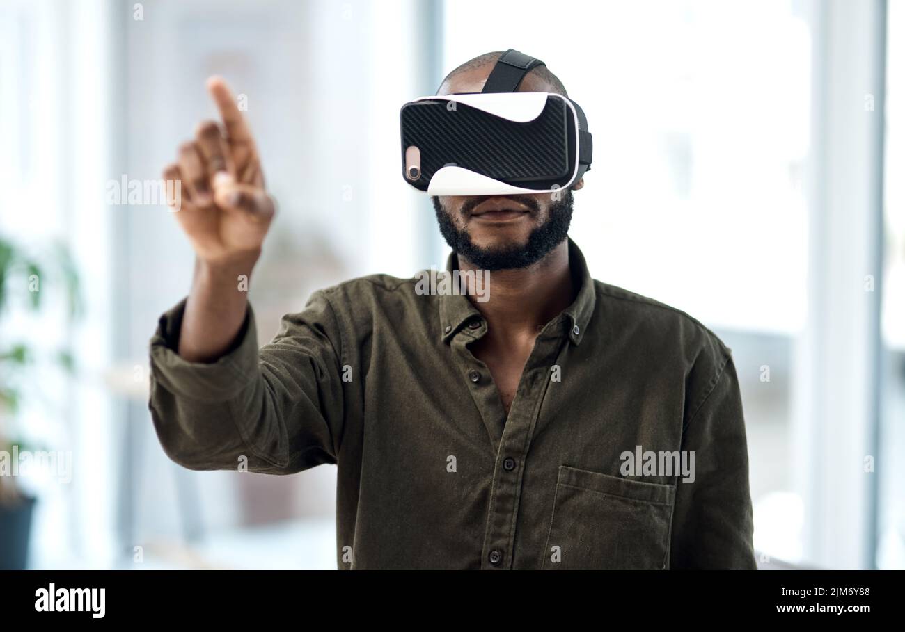 Experience business like never before. a young businessman using a ...