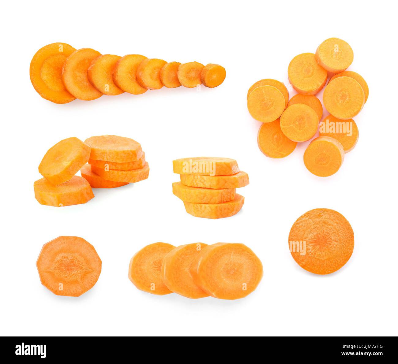 Set of fresh cut carrot isolated on white Stock Photo - Alamy
