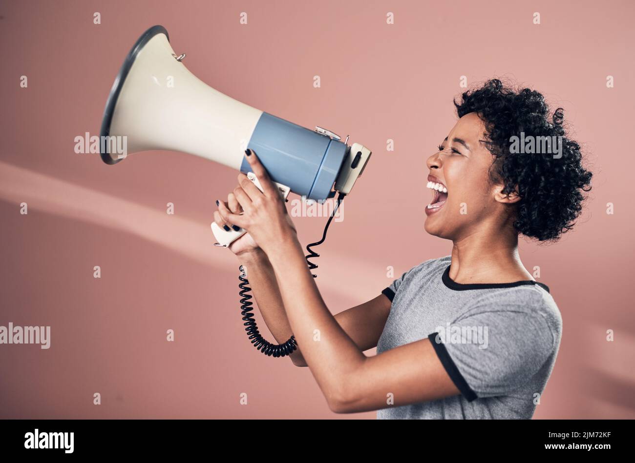 Female megaphone hi-res stock photography and images - Alamy