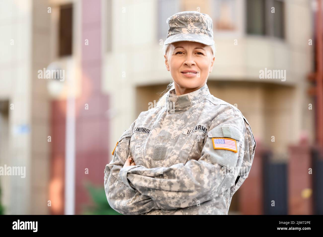 Mature female soldier in military uniform outdoors Stock Photo - Alamy