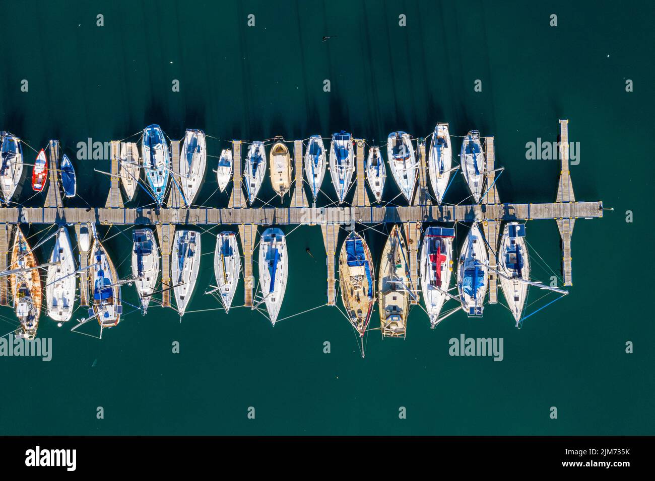 Life at sea is a whole new experience. High angle shot of boats at a ...