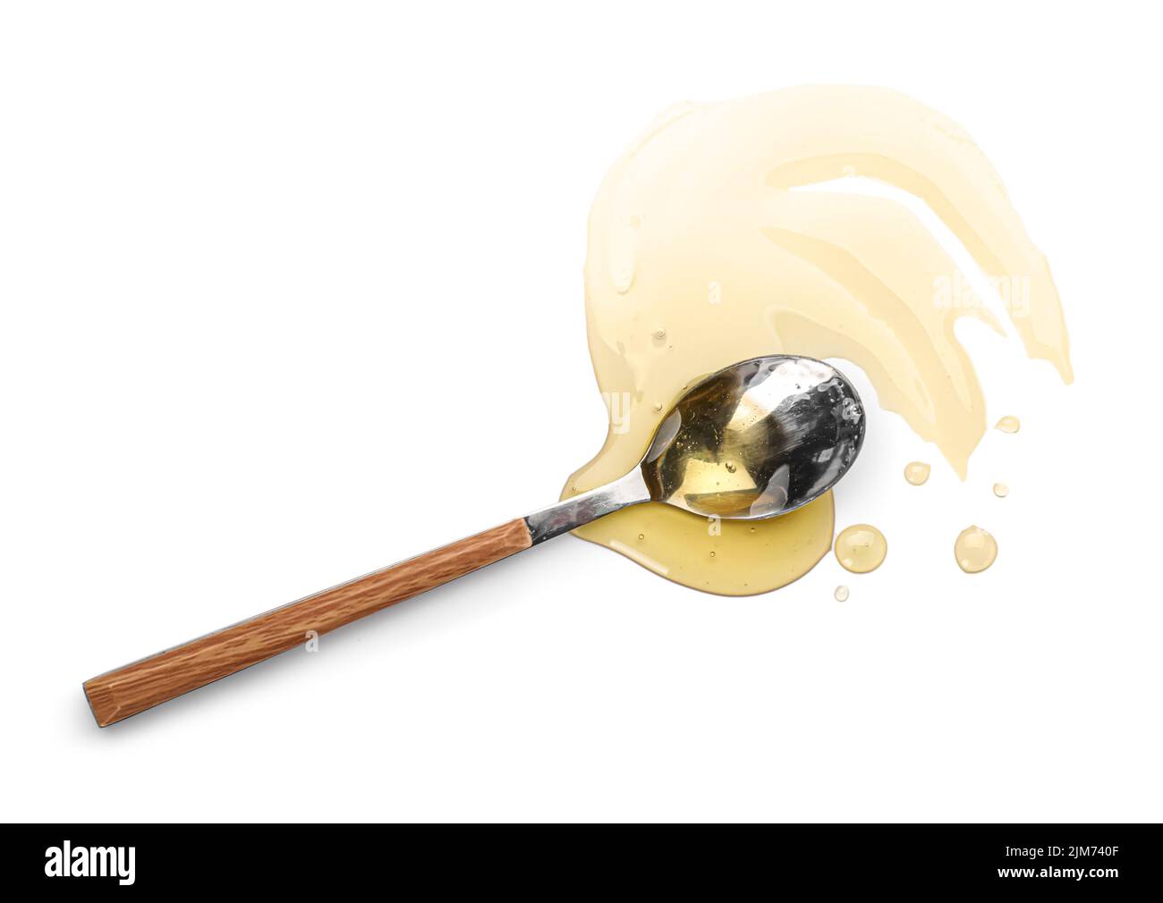 Spoon with tasty maple syrup on white background Stock Photo - Alamy
