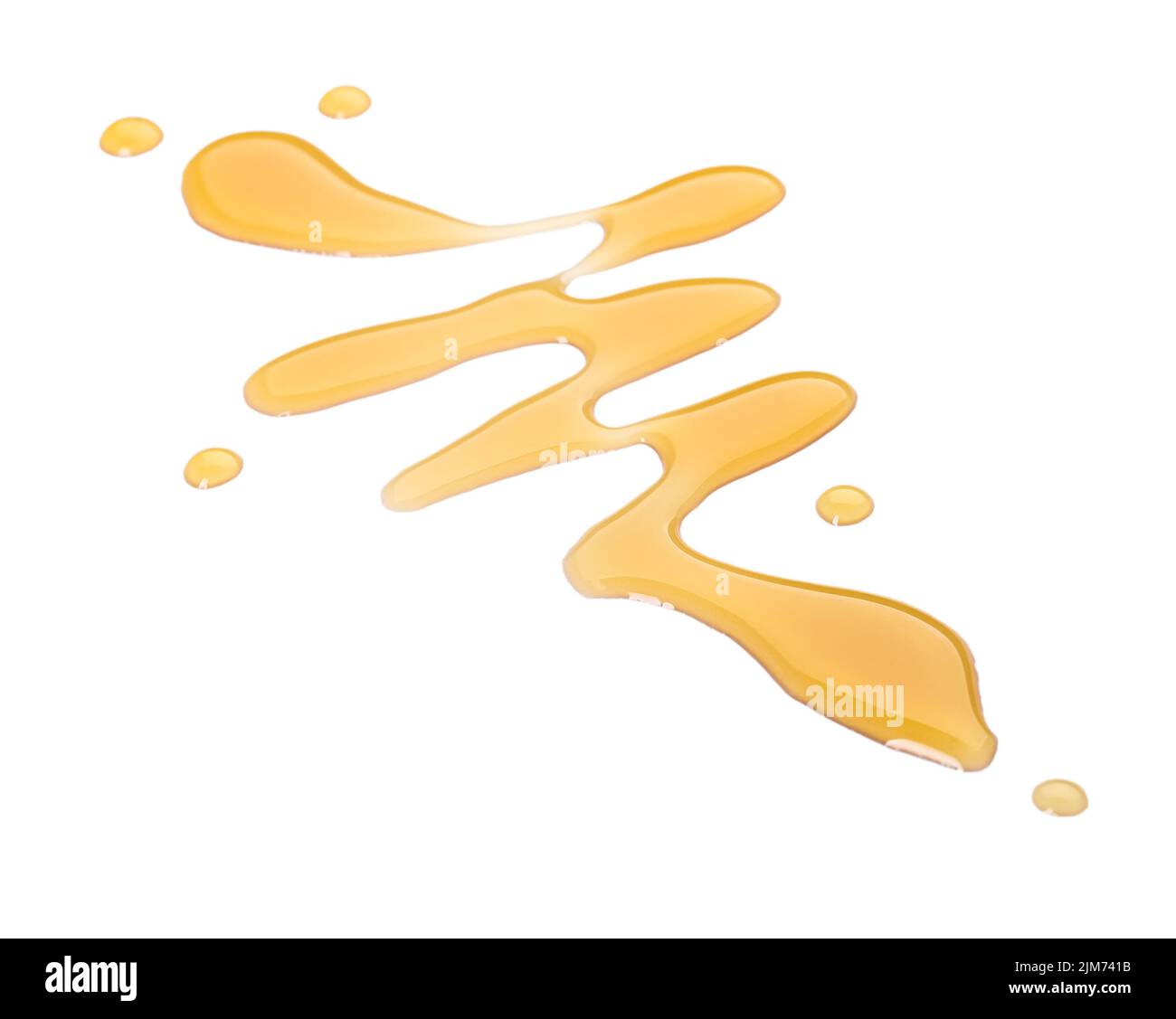 Spilled maple syrup on white background Stock Photo - Alamy