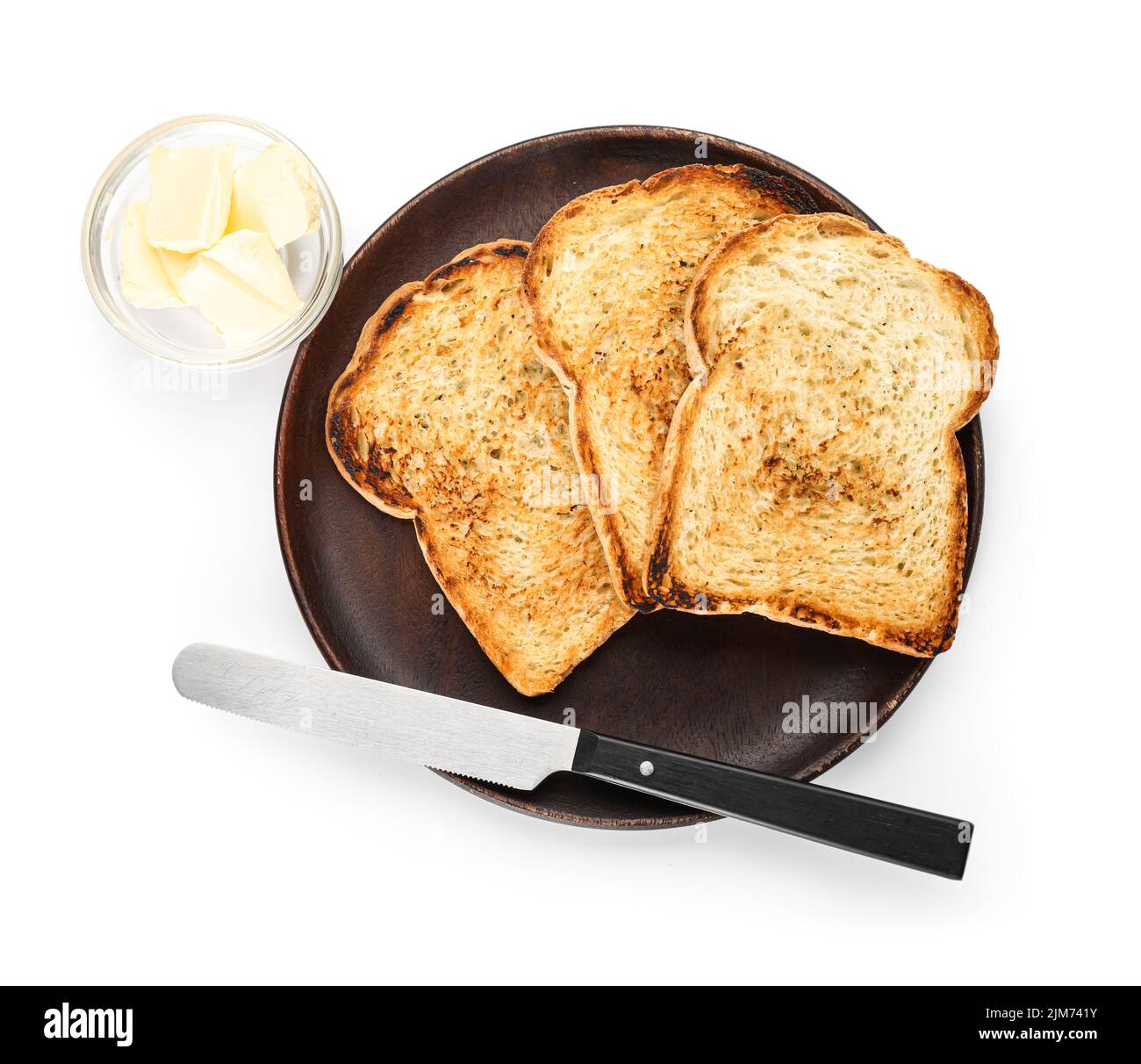 Plate with toasts, knife and bowl of butter isolated on white ...