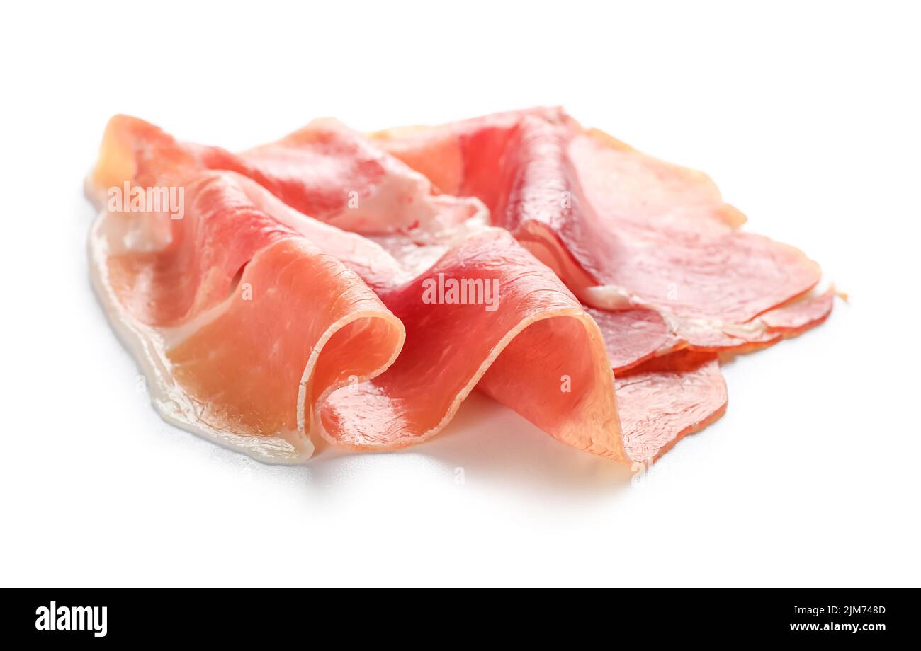 Slice of jamon on white background Stock Photo - Alamy