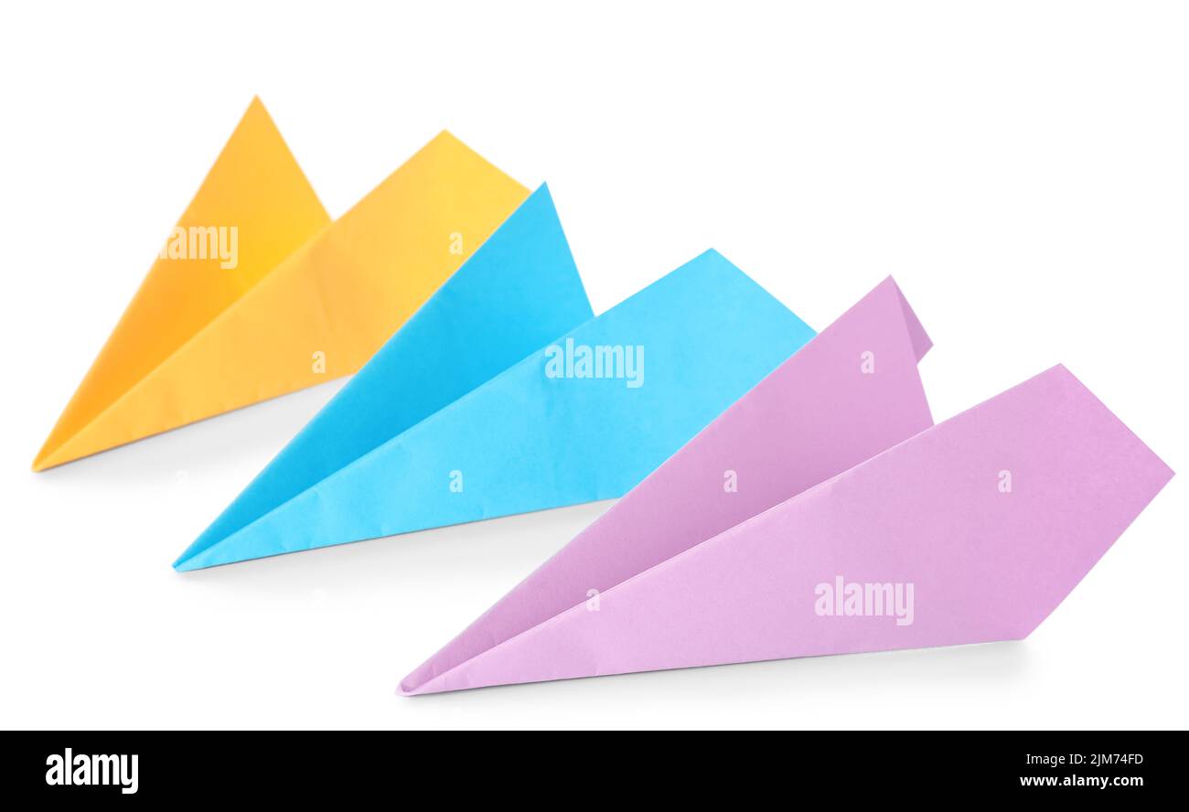 Colorful paper planes on white background Stock Photo - Alamy