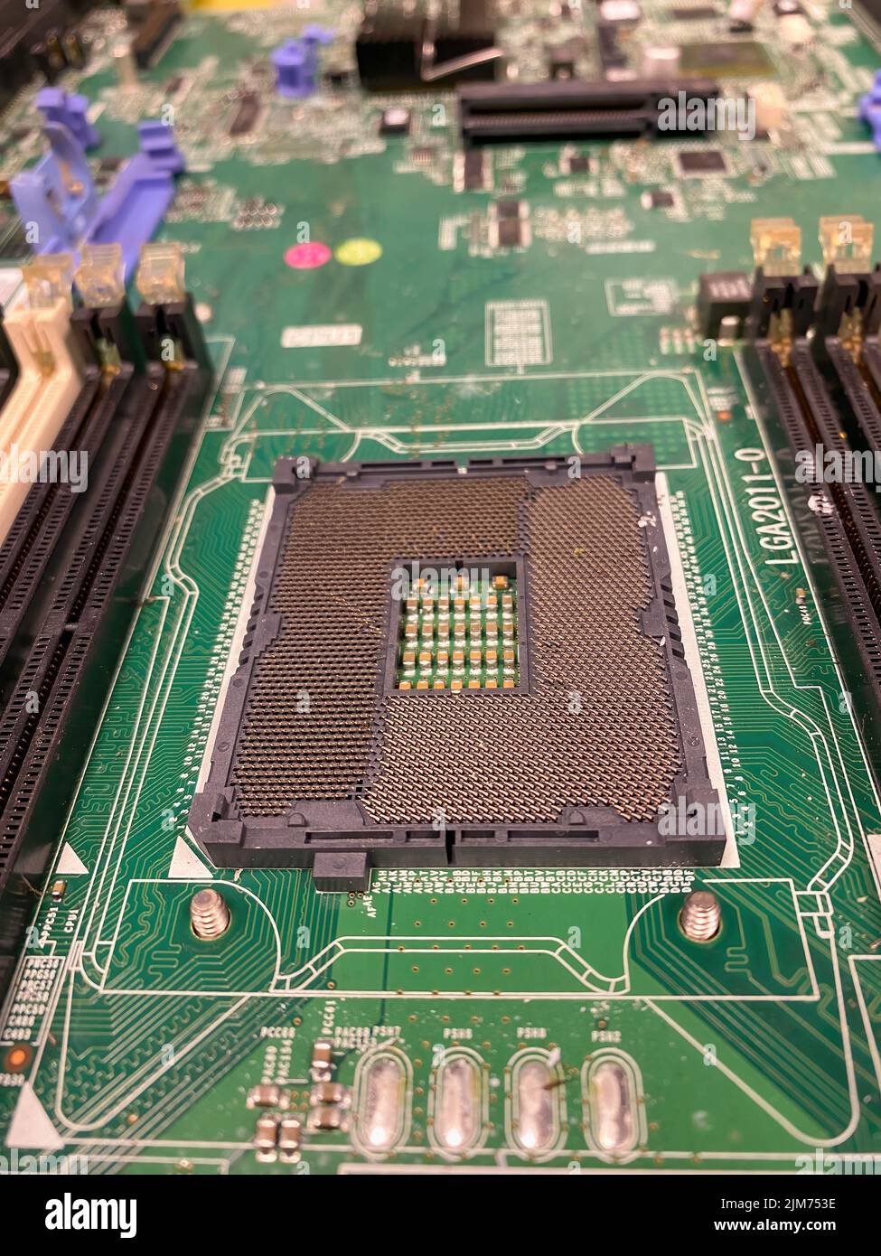 Computer motherboard being dismantled for recycling. High Quality Image ...
