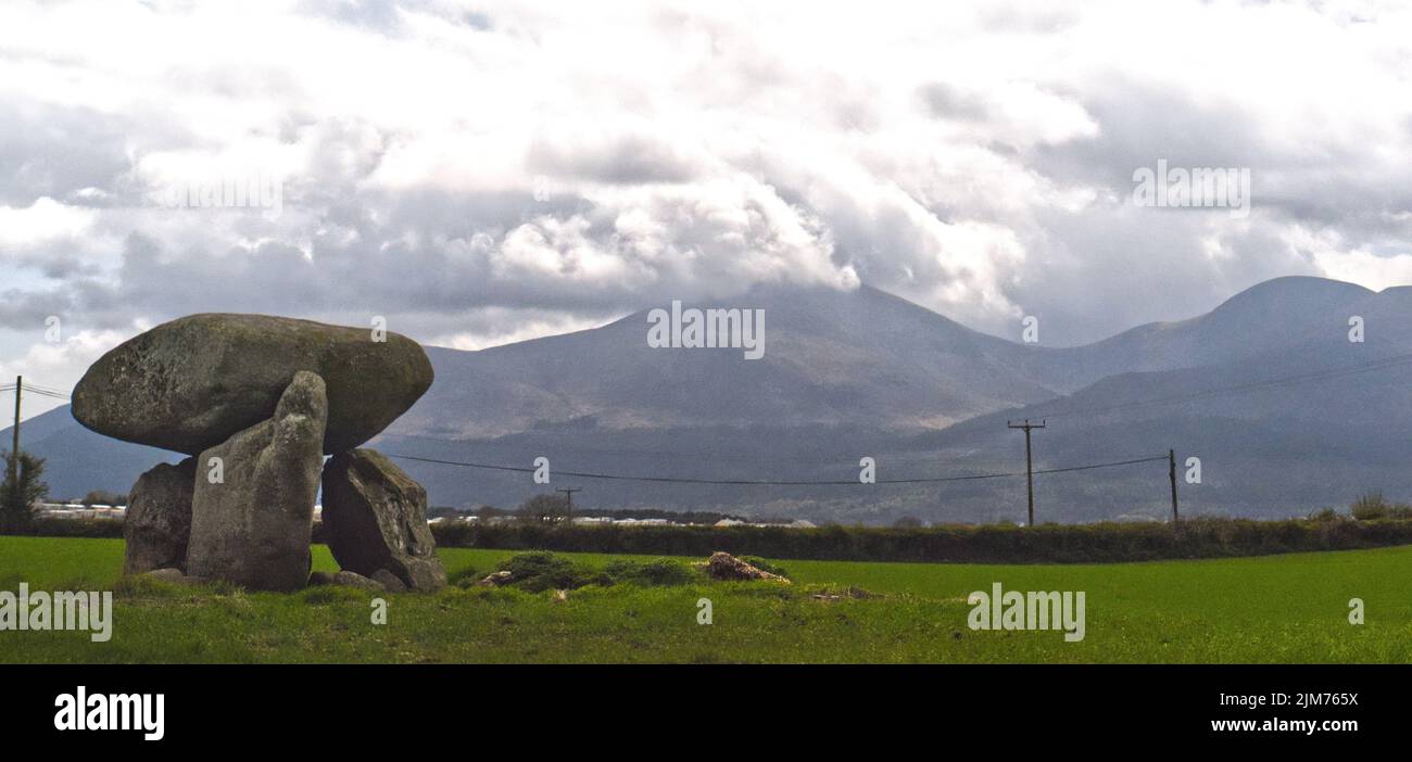 A view of Slidderyford dolmen - a small, round dolmen lost in the ...