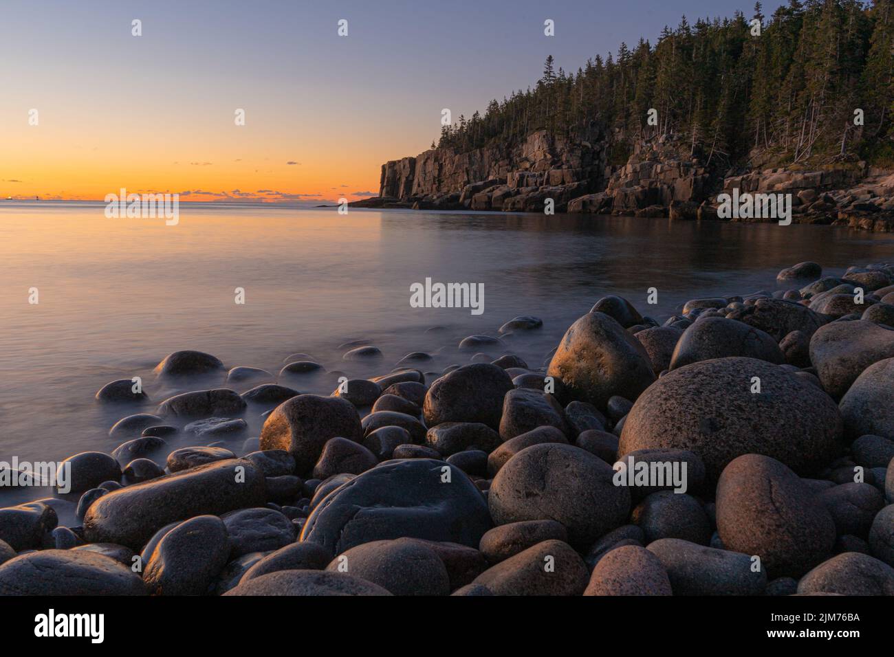 A beautiful scene of Boulder Beach in Acadia National Park, Maine with ...