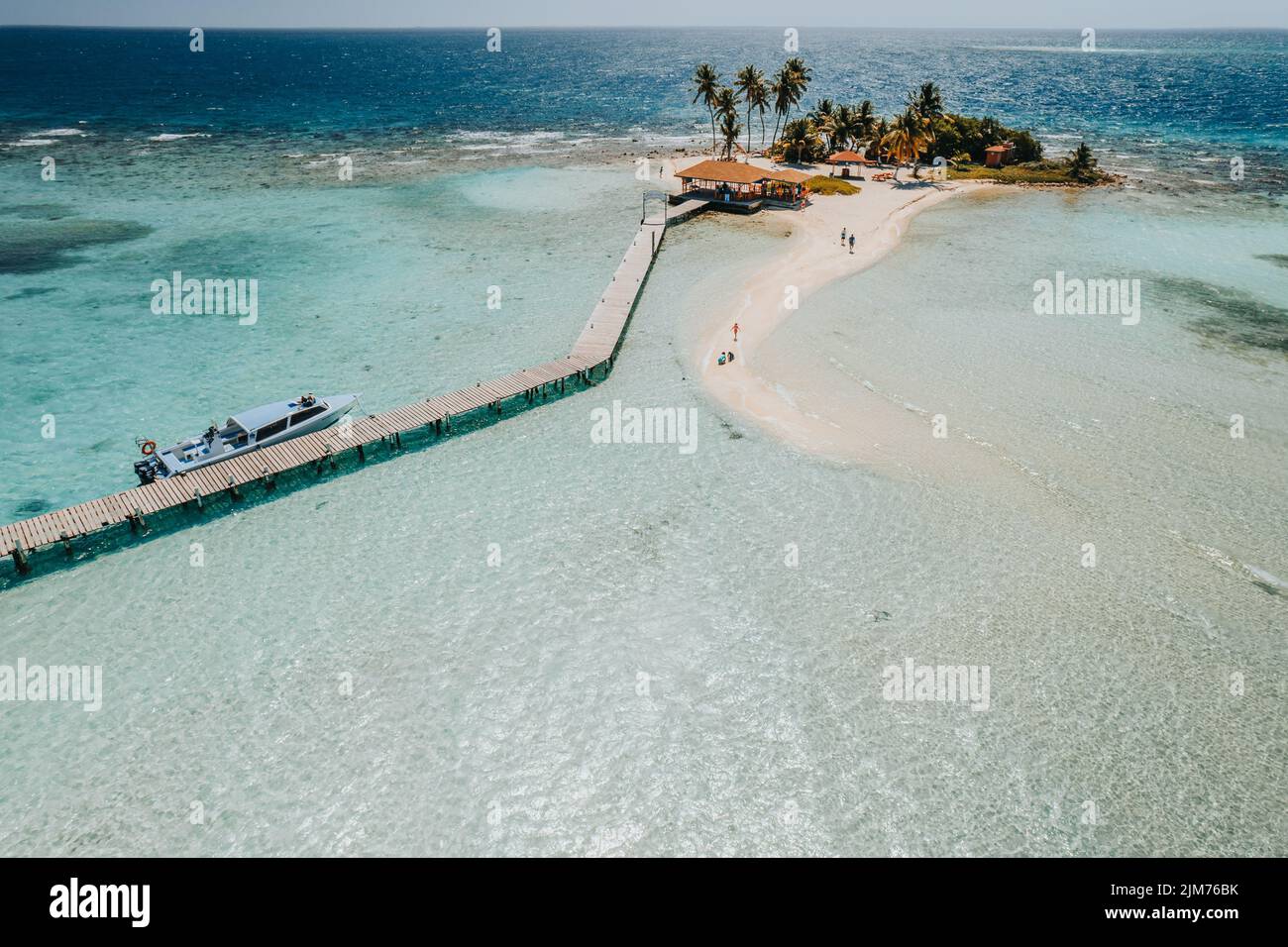 An aerial view of the Goff's Caye island in the Caribbean Sea, Belize ...