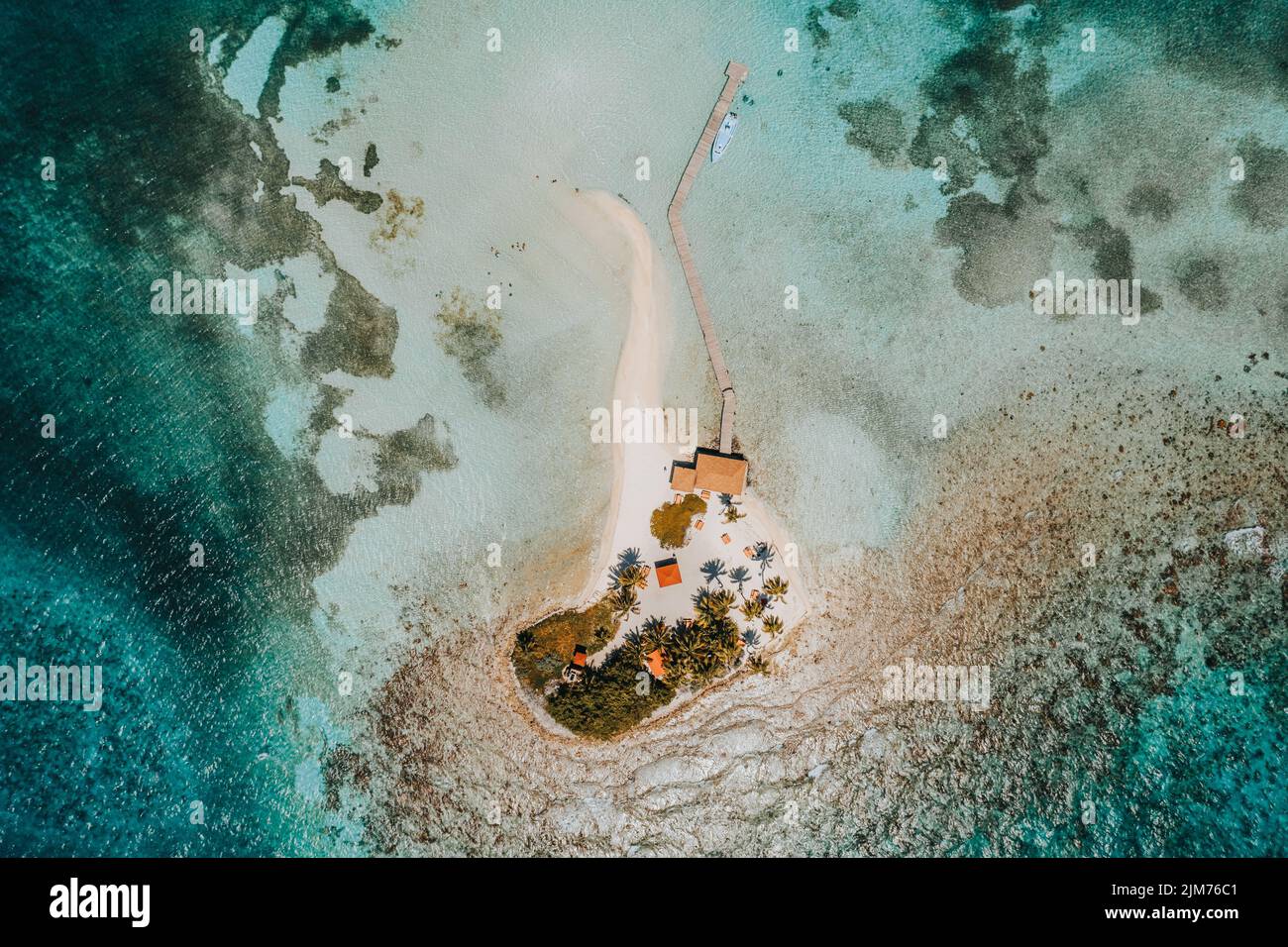 A breathtaking aerial top view of a small island in Belize surrounded ...