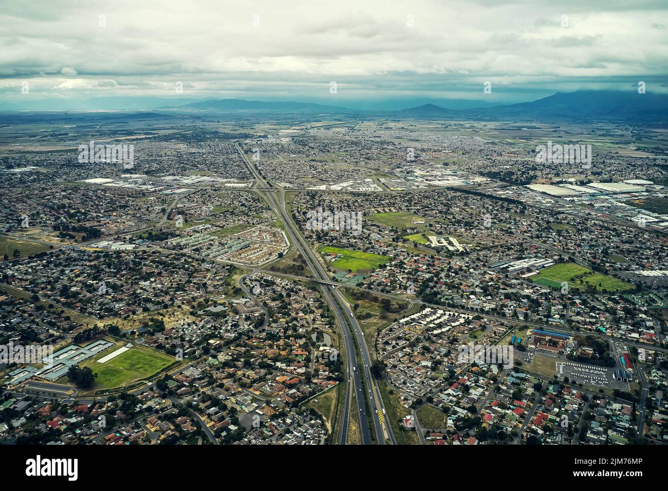 Getting back to normal. High angle shot of roads and freeways in and ...