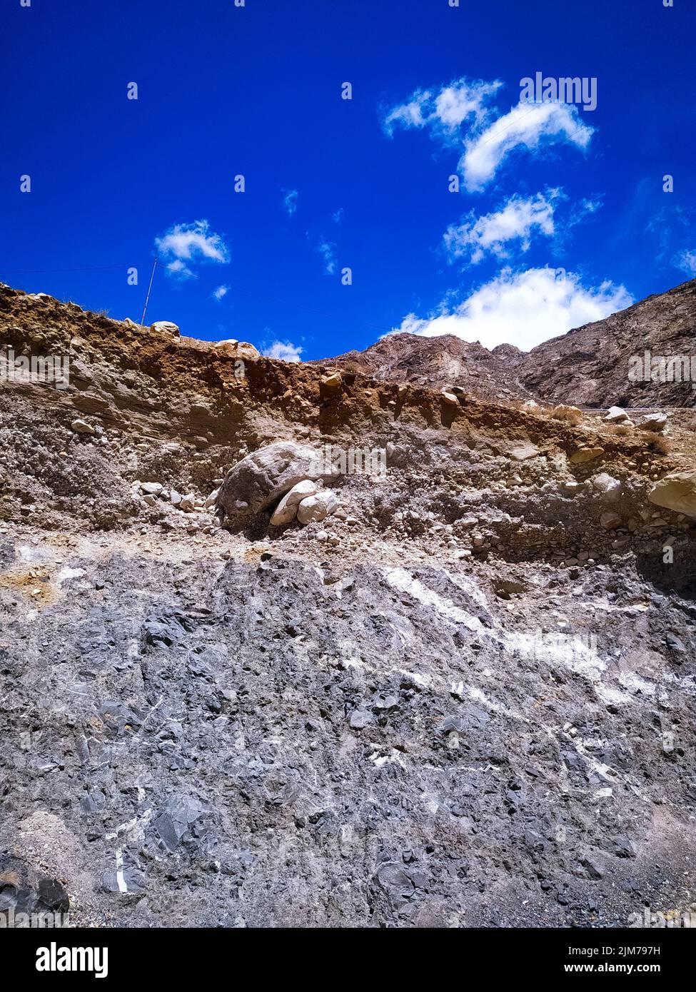 A beautiful view of a rocky mountain with a blue sky background Stock ...
