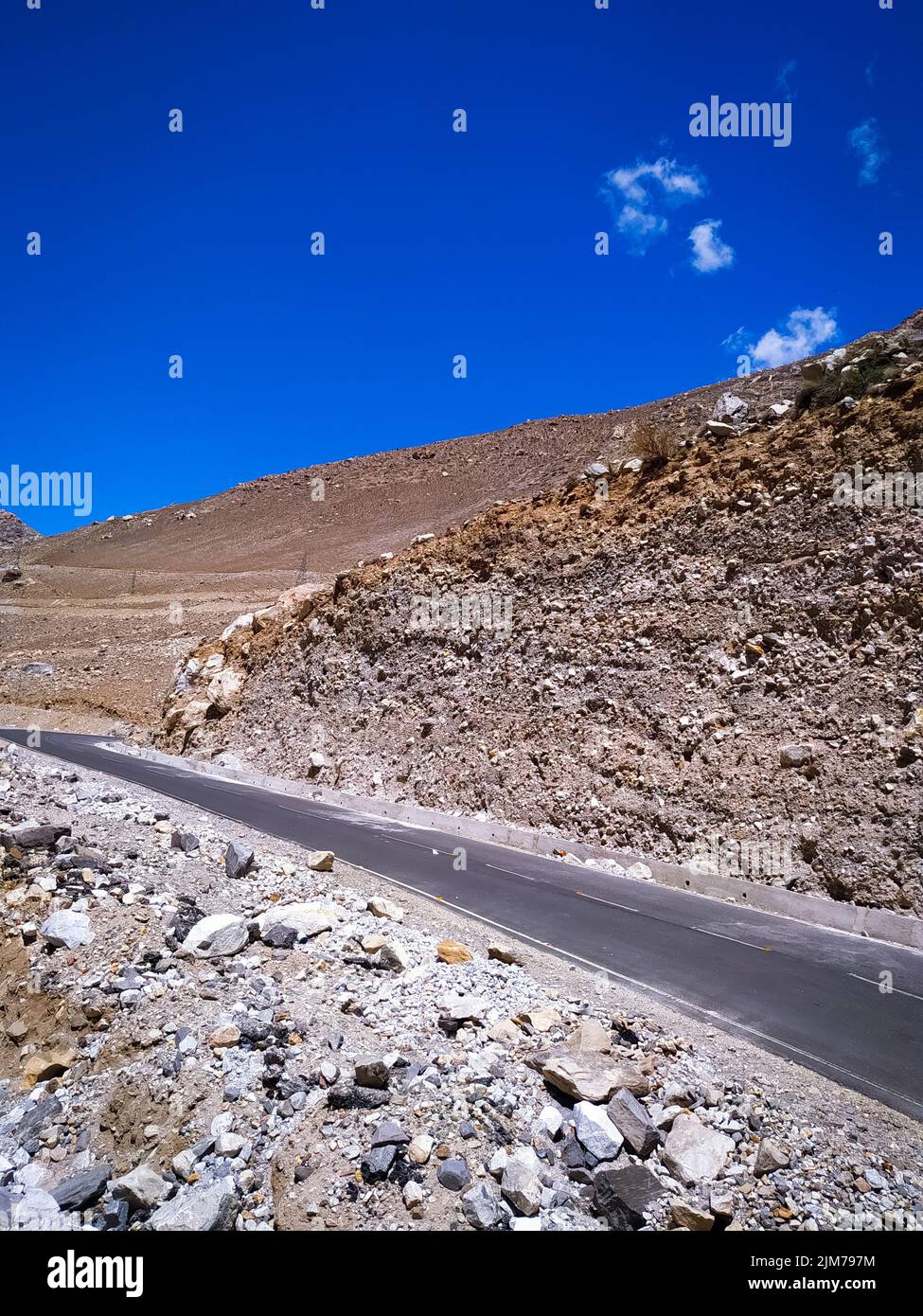 A beautiful view of a rocky mountain with a blue sky background Stock ...