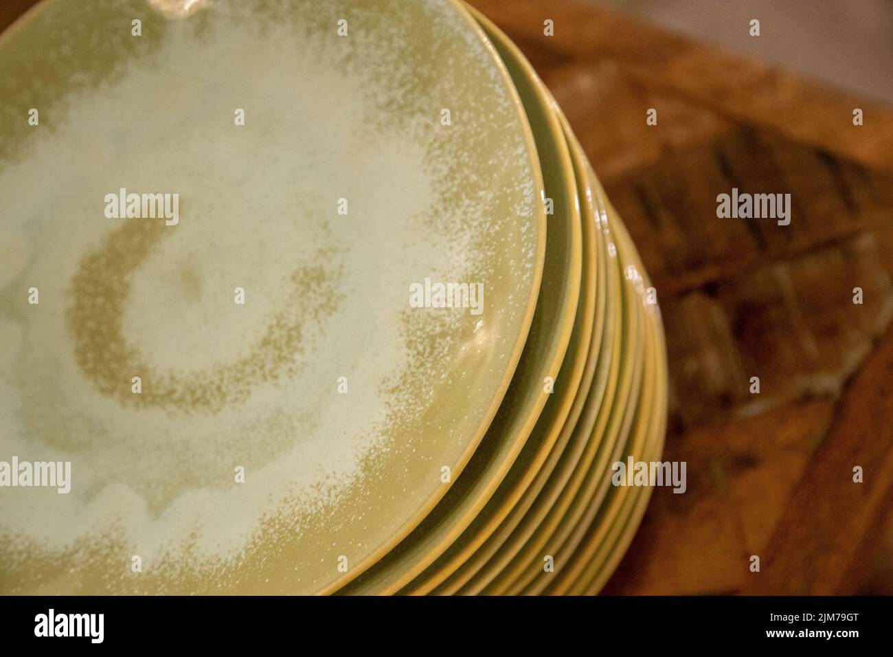 low light wood table green uneven artistic Stock Photo - Alamy