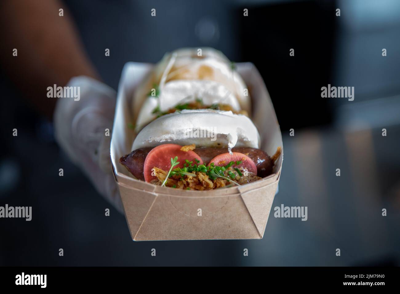 Eating sausage bun hi-res stock photography and images - Alamy