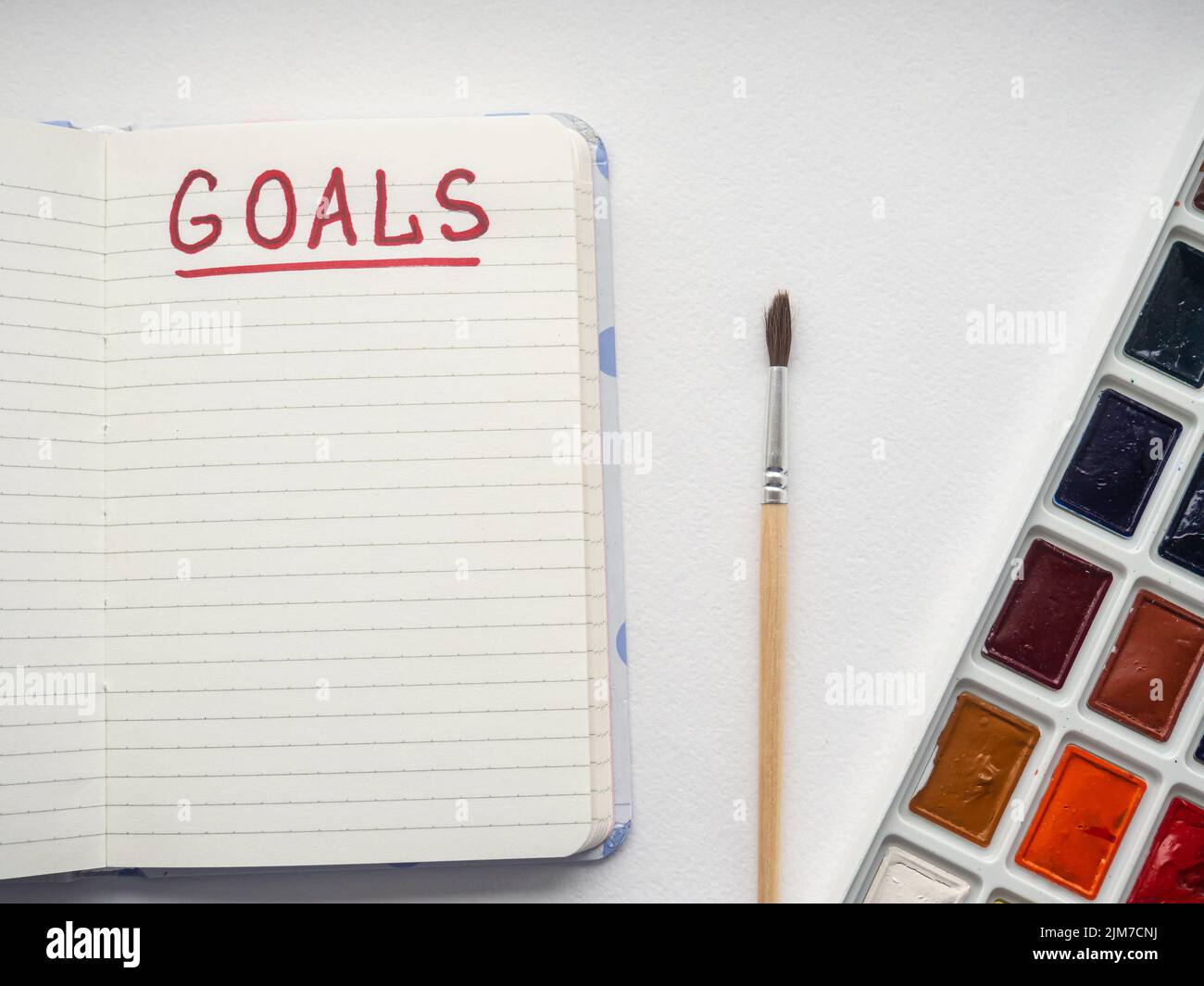 Goals in notepad lettering with red paints Stock Photo - Alamy
