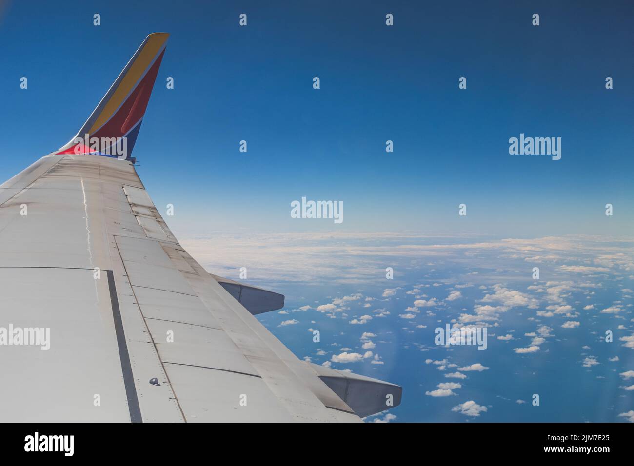 A beautiful view over the wing of southwest airlines 737-800 airplane ...