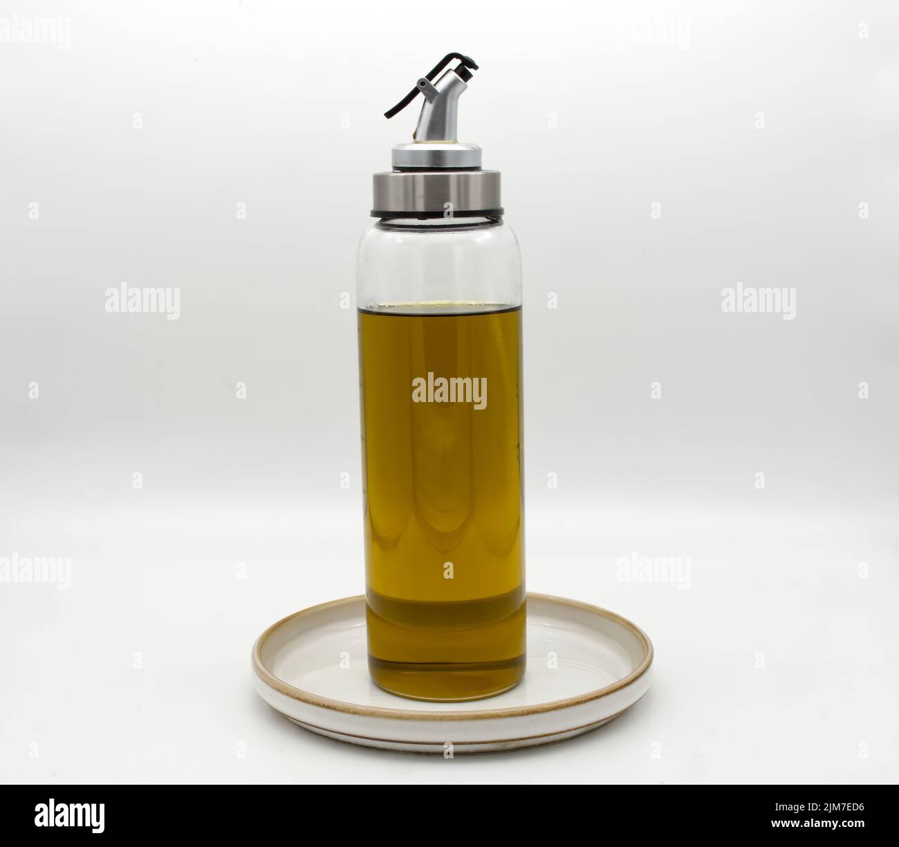 Extra virgin olive oil isolated on white background Stock Photo - Alamy