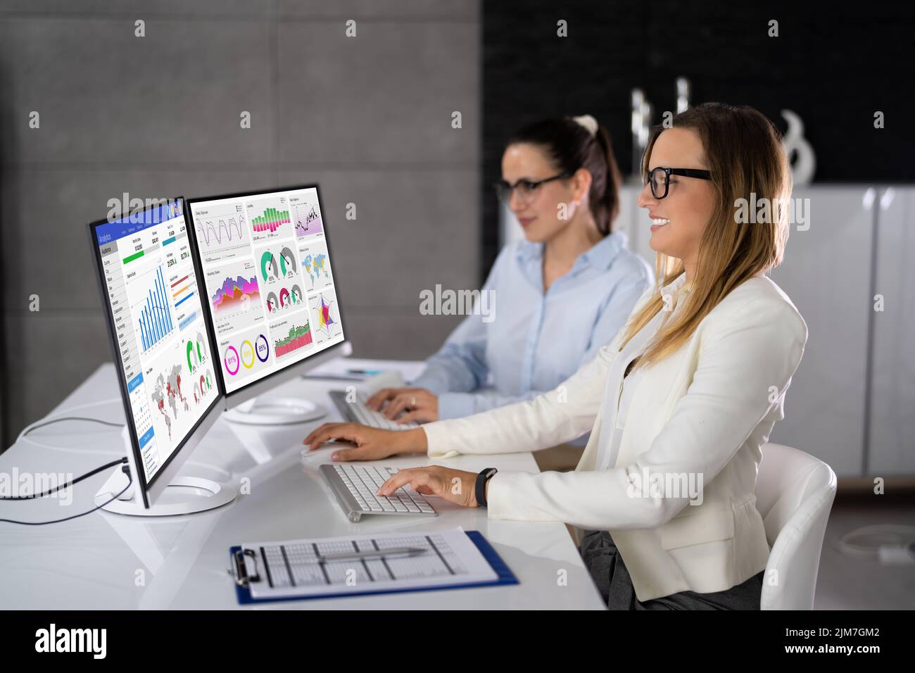 Analyst Woman Looking At Business Data Analytics Dashboard Stock Photo ...