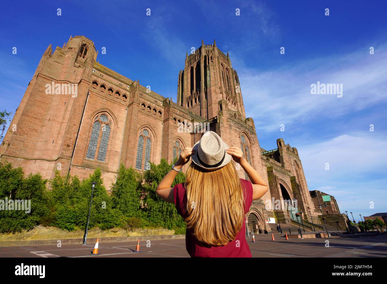 Back view of tourist girl looking the Cathedral Church of Christ ...