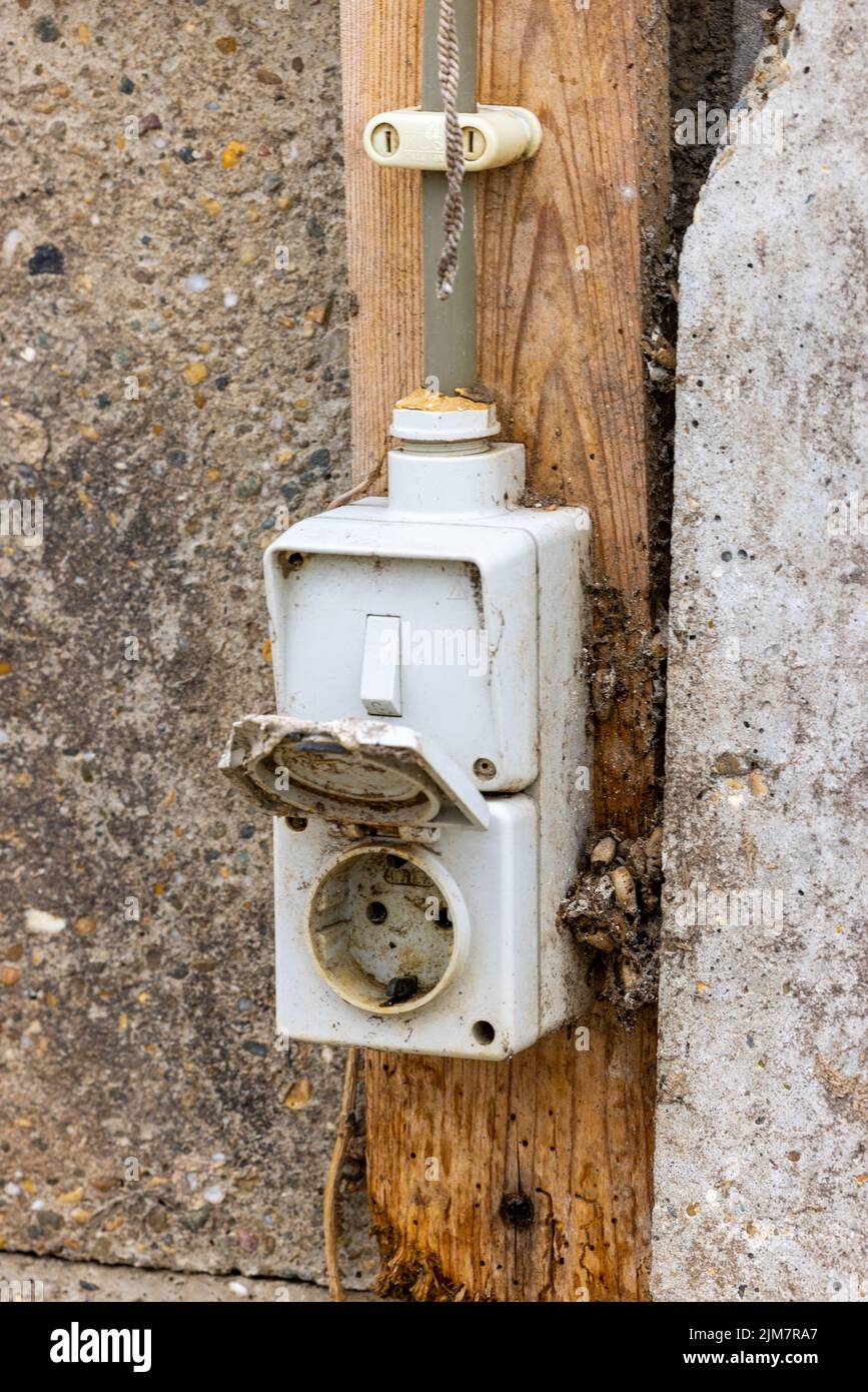 A vertical shot of an old electrical switch and power supply Stock ...