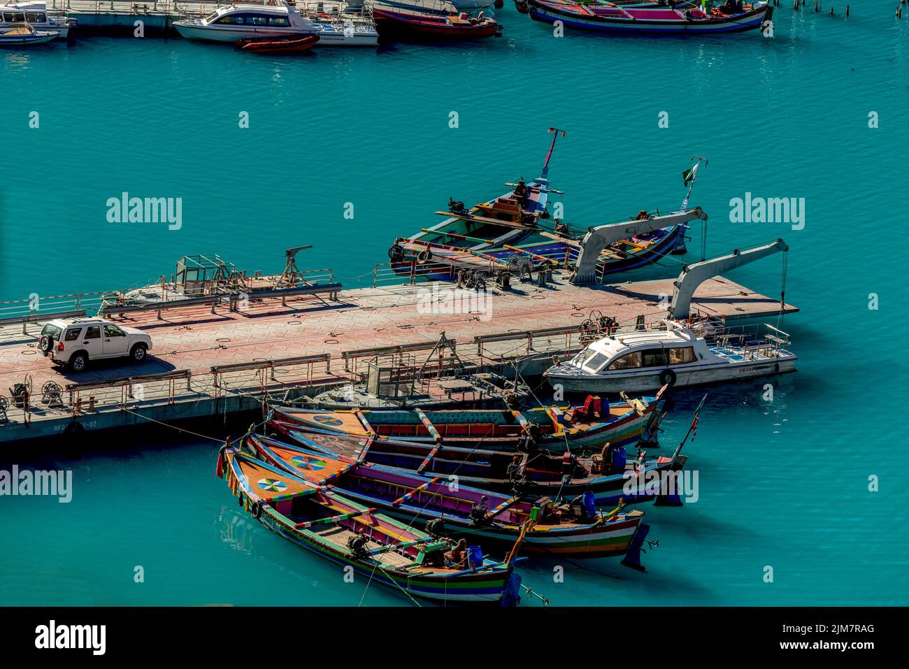 beautiful landscape of mountain lake with boats and bank , atabad lake ...