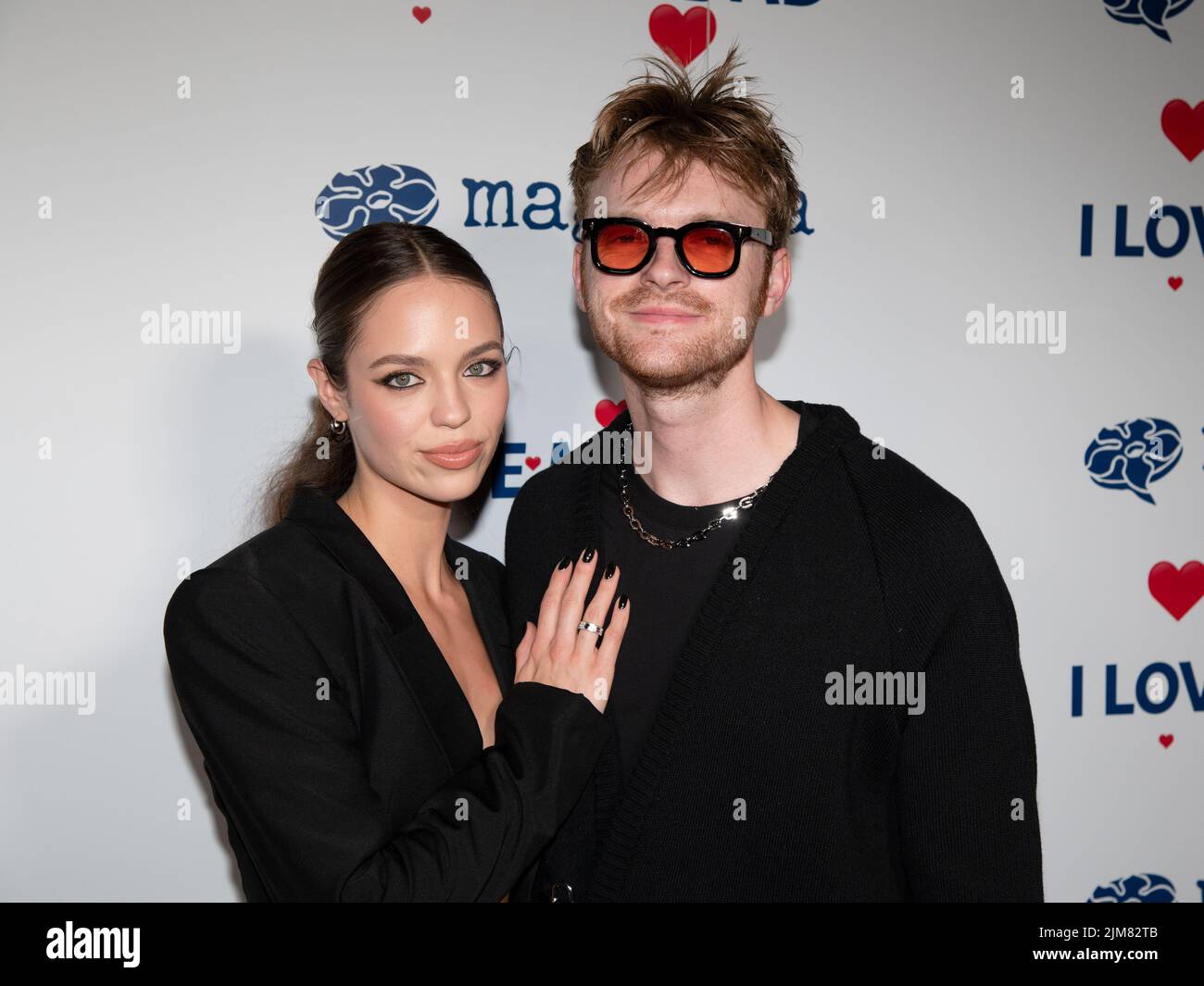 August 4, 2022, West Hollywood, California, USA: Claudia Sulewski and FINNEAS attend the Los ...