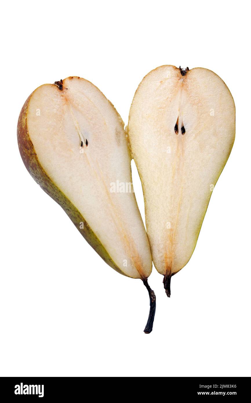 Green pear halves with seeds Stock Photo - Alamy