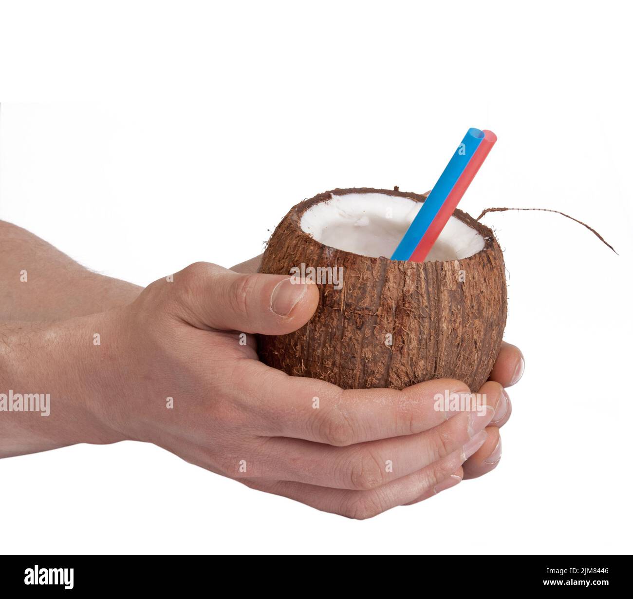 Ripe coconut in hand hi-res stock photography and images - Alamy