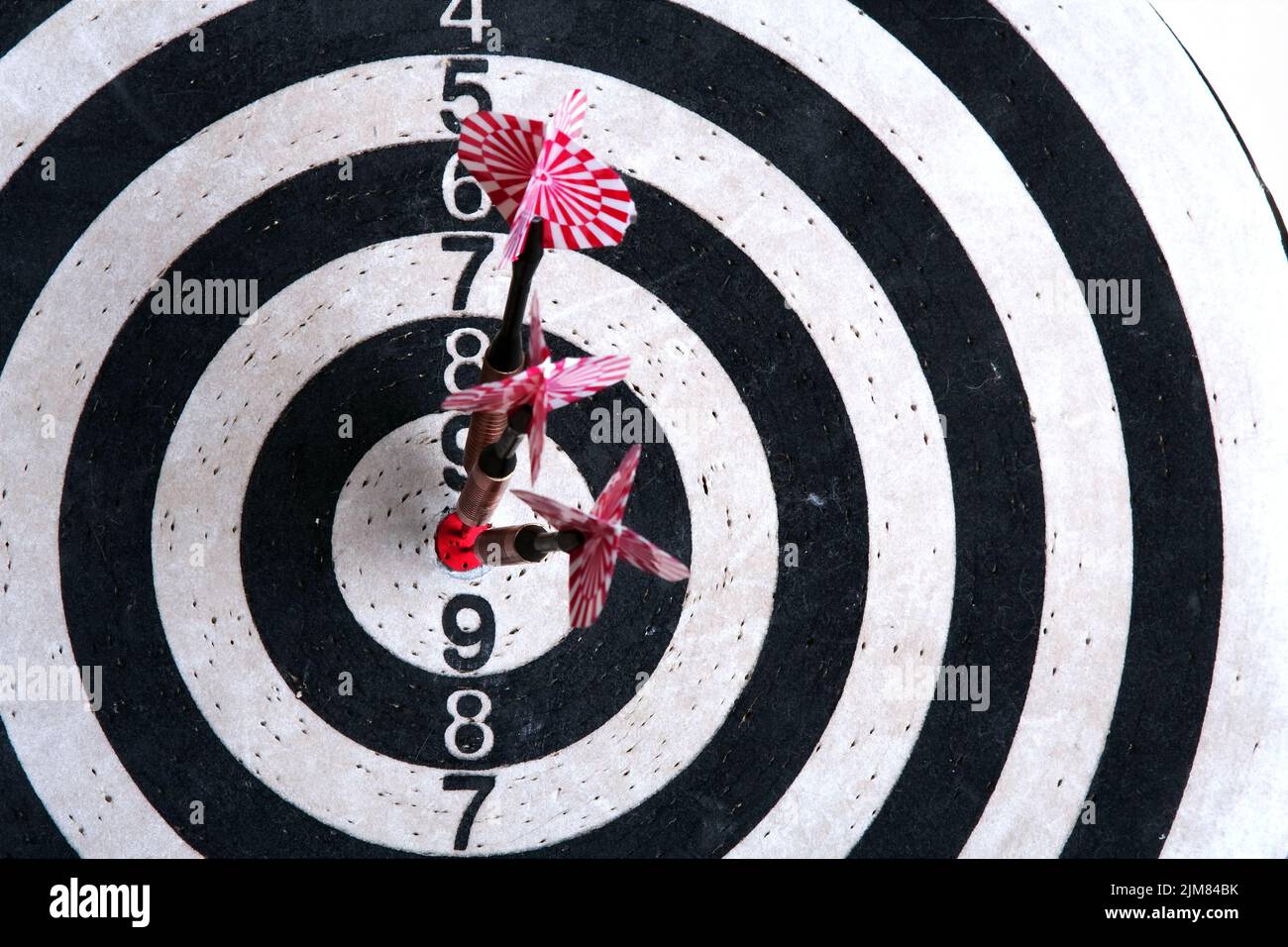 Darts board with arrows Stock Photo - Alamy