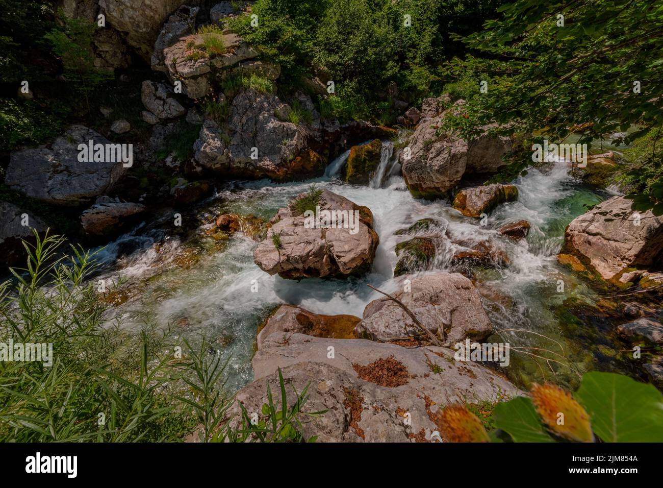 Valbone river rapids close to bridge to popular tourist attraction in ...