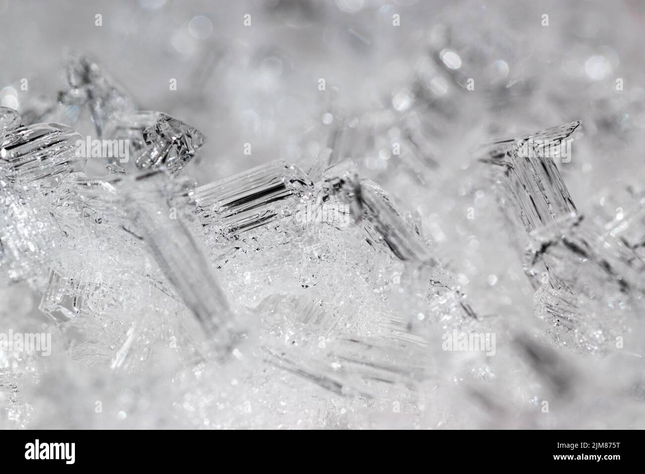 Transparent frozen small ice pieces. Abstract full frame background ...