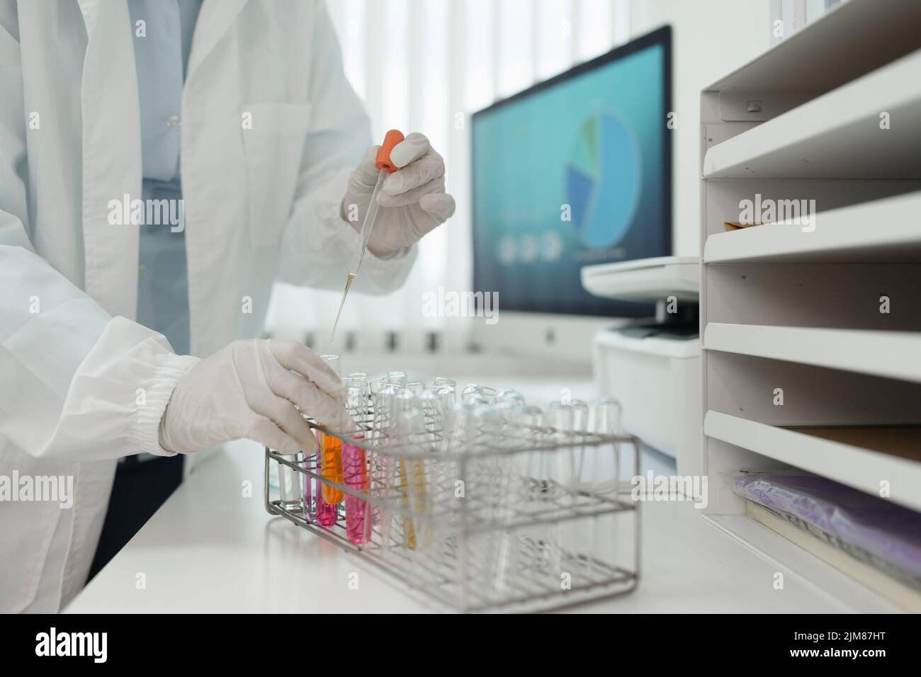 Scientist researchers analysing with test tube medical science ...