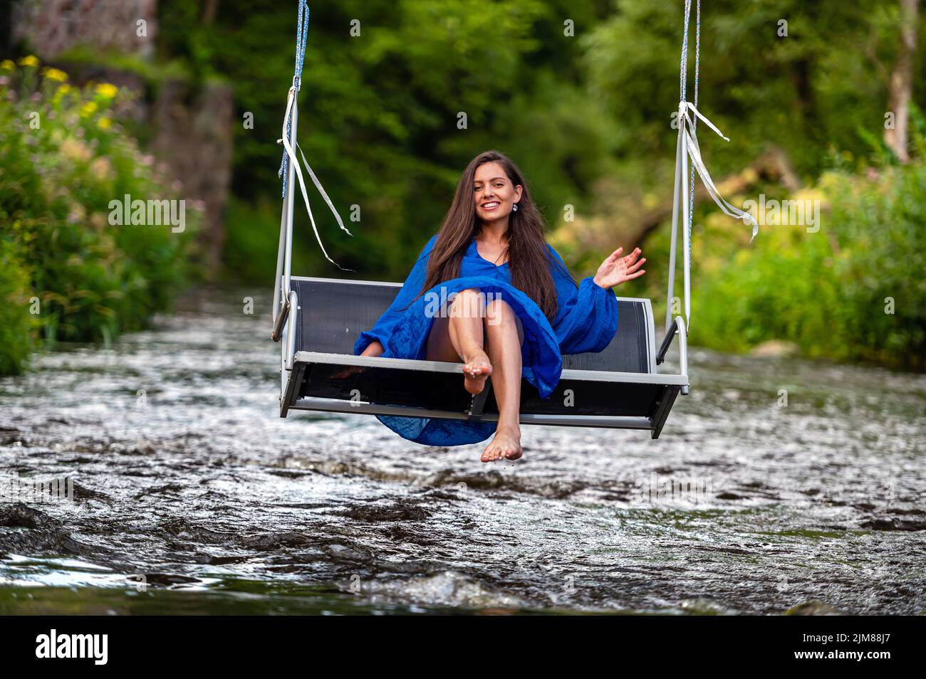 Swings over water hi-res stock photography and images - Alamy