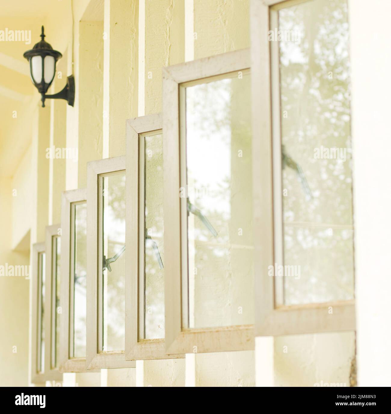 Row of opened windows Stock Photo - Alamy