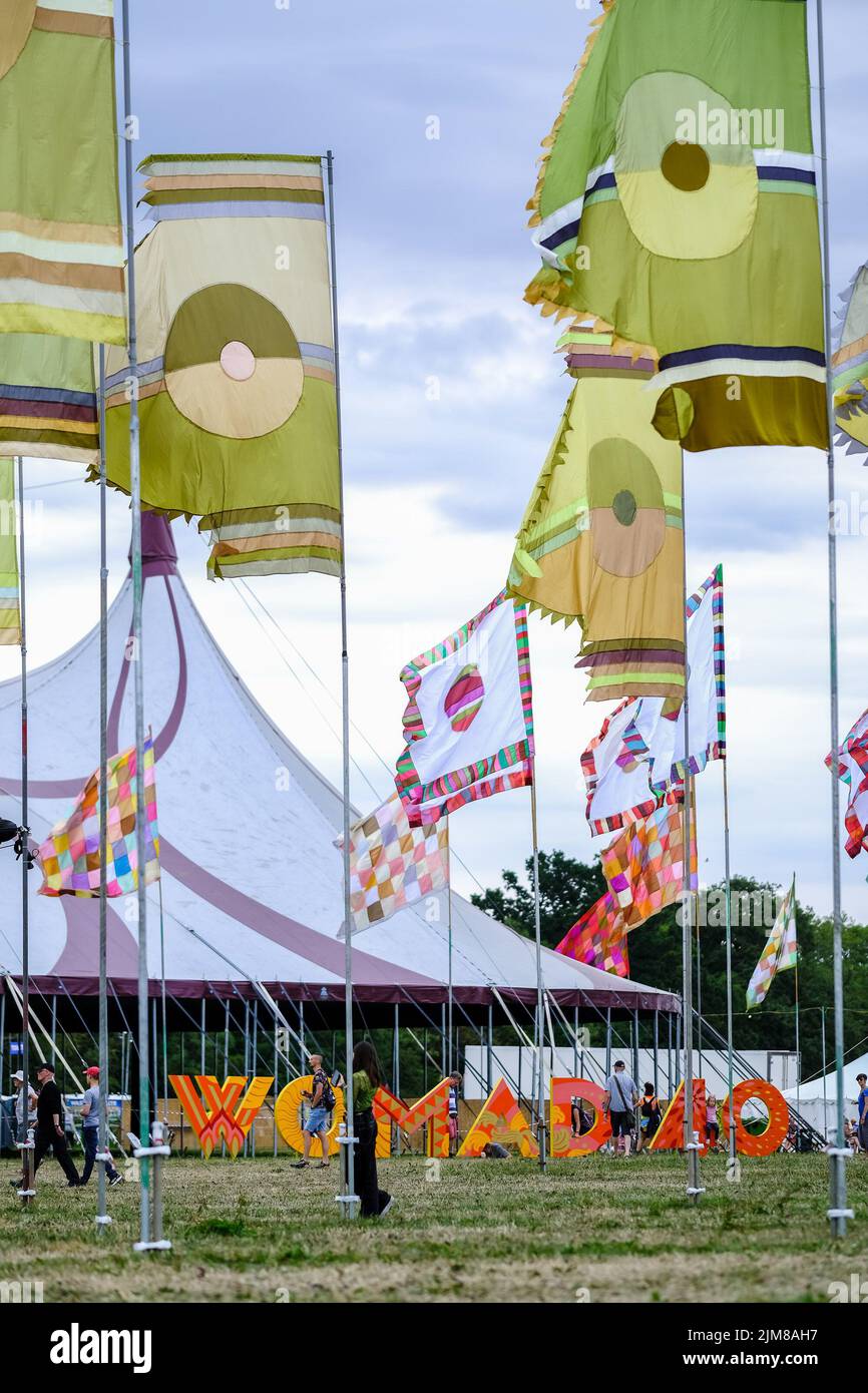 Flags fly over the WOMAD 40 sign as the festival celebrates its 40th ...