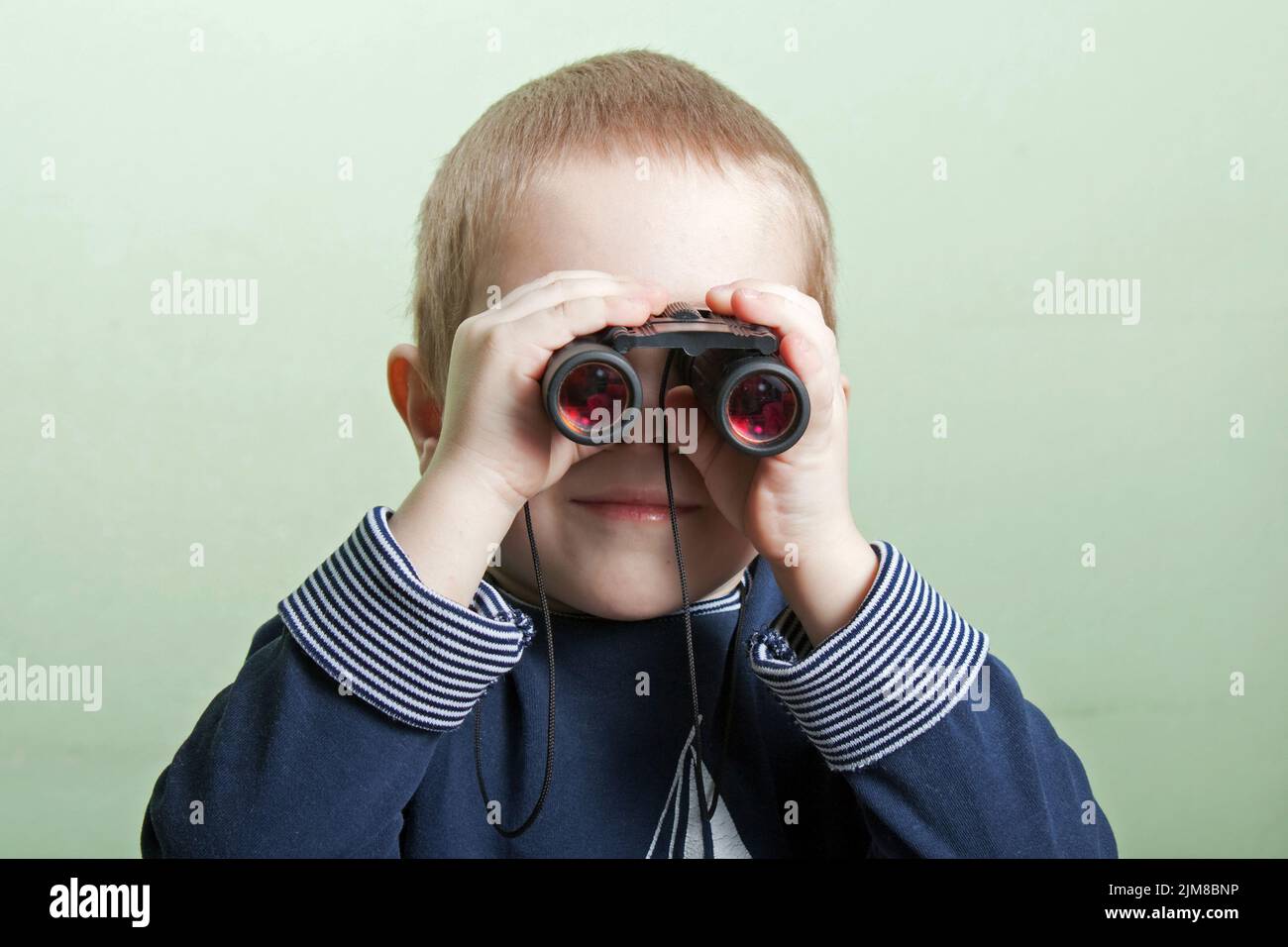 Child with binoculars Stock Photo - Alamy