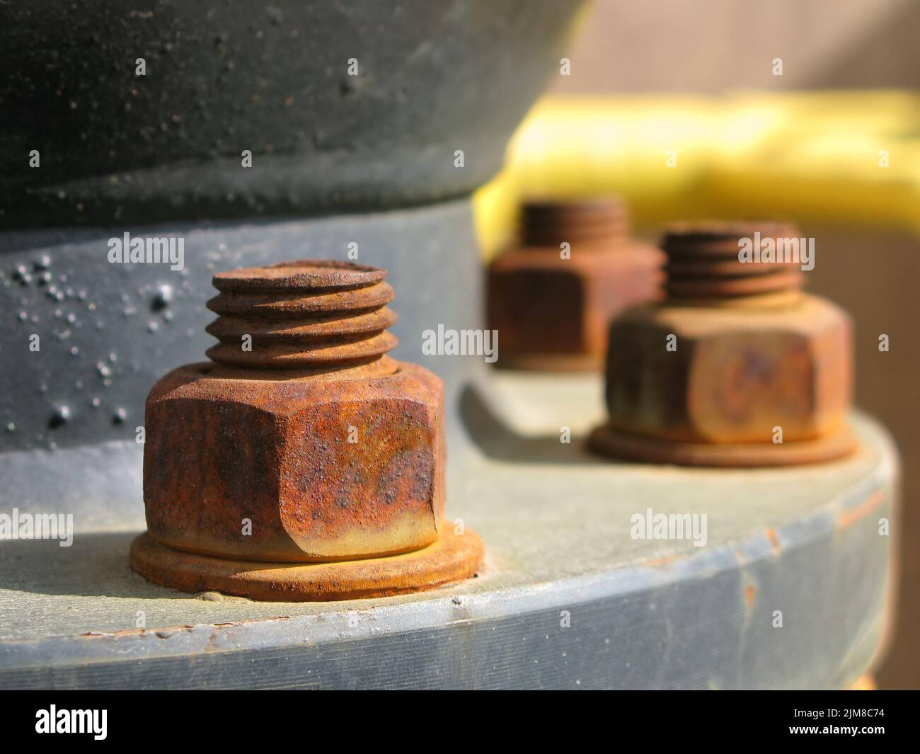 Old rusty metal nut on iron water valve Stock Photo - Alamy