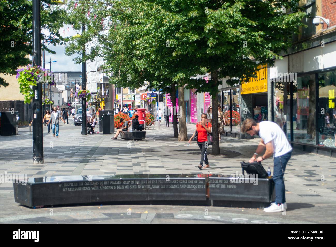 Slough, Berkshire, UK. 4th August, 2022. Shoppers in Slough High Street ...