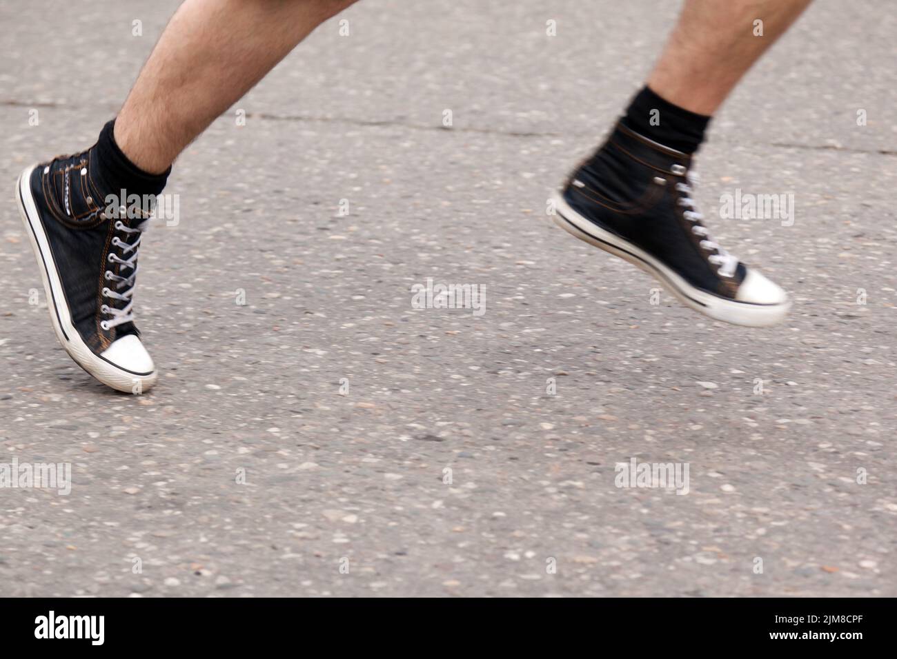 Running athlete foot Stock Photo - Alamy