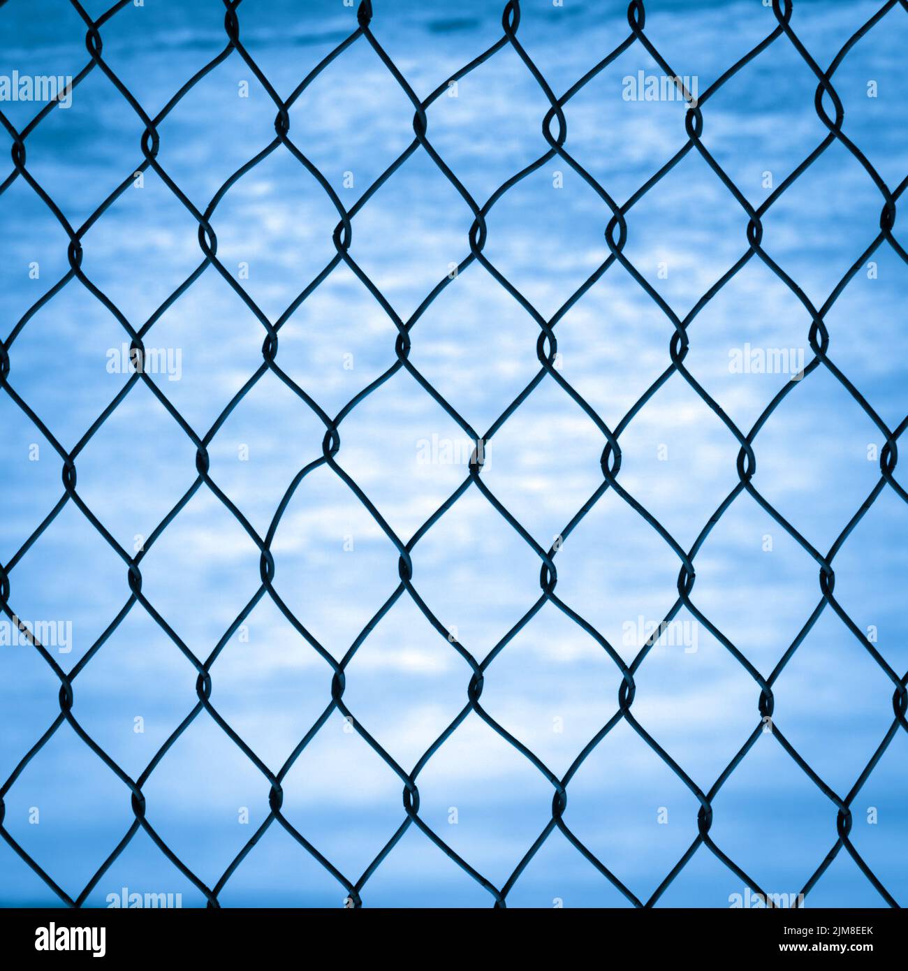 Mesh fence isolated Stock Photo - Alamy