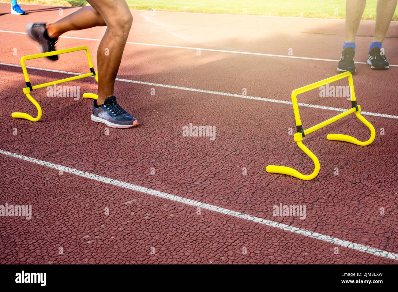 Short track woman running hi-res stock photography and images - Alamy